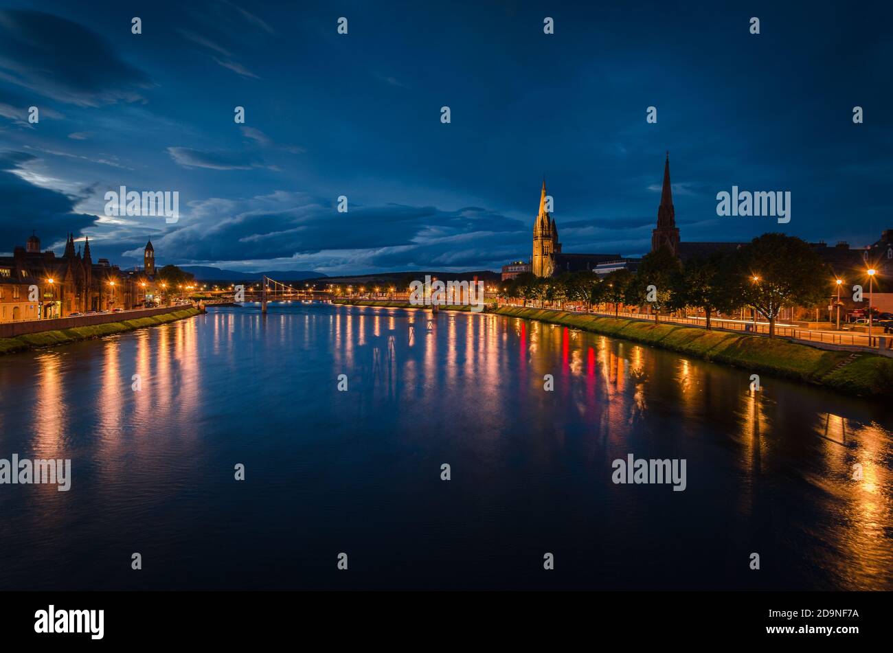 Inverness city landscape at night with the lights reflected in the ...