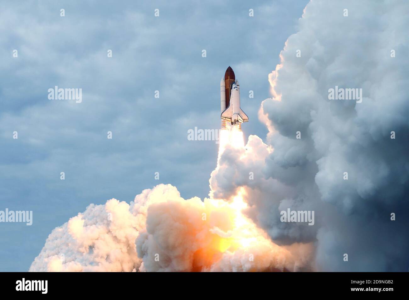 The launch of the space shuttle against the background of the sky and ...