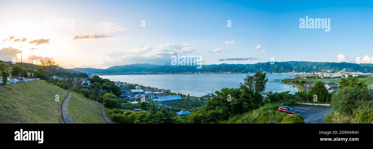 Panorama view of Suwa lake in Nagano, Japan in sunset time with city ...