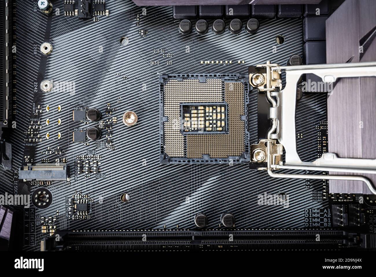 Closeup detail of CPU socket of a modern computer black motherboard ...