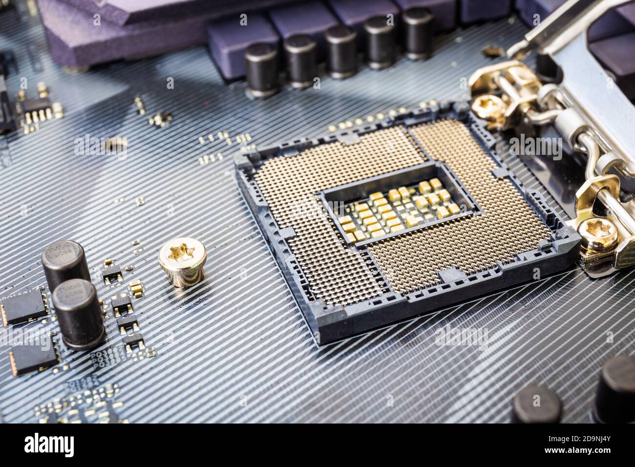 Closeup detail of CPU socket of a modern computer black motherboard ...