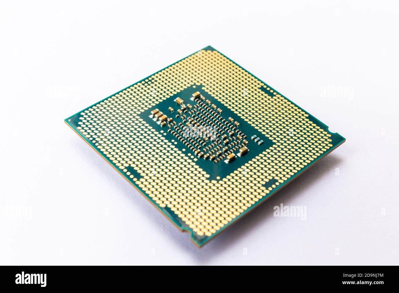 Modern CPU processor chip isolated on white background. Select focus ...