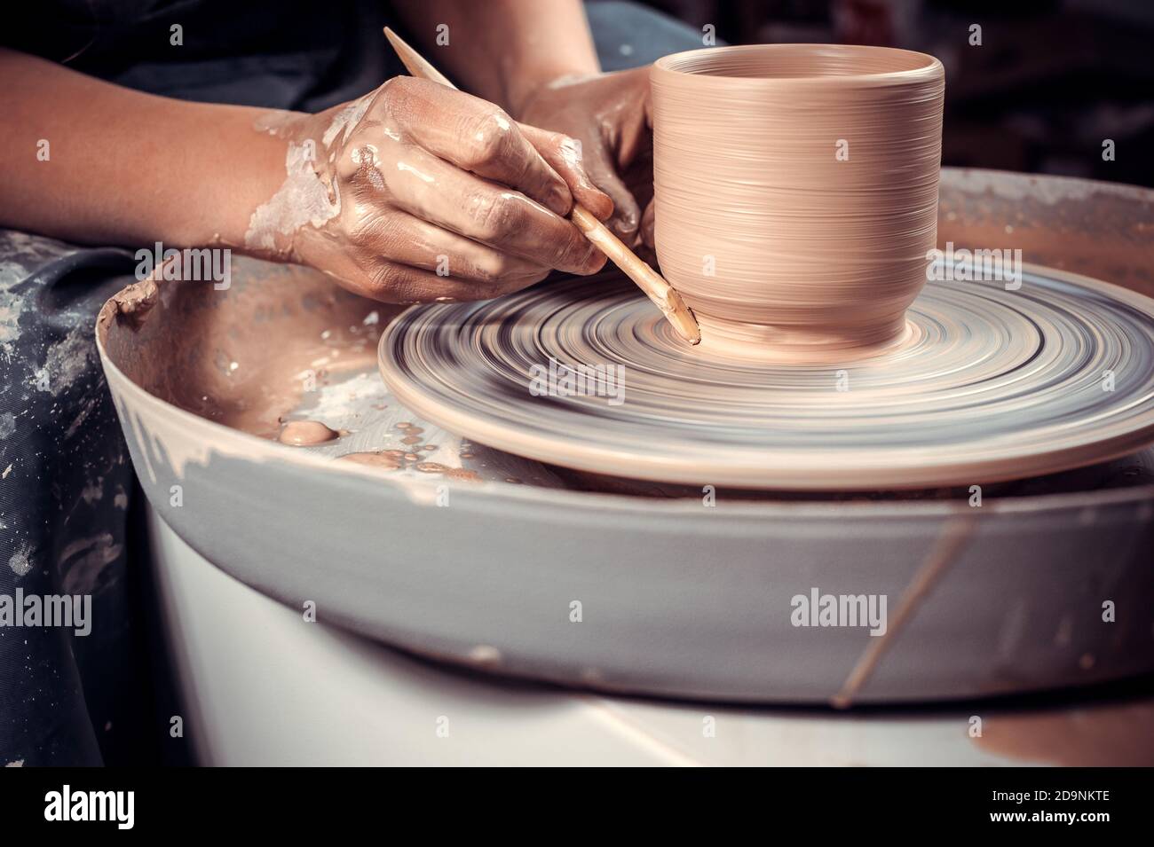 The process of making a clay jug on a potter's wheel. Close-up Stock ...