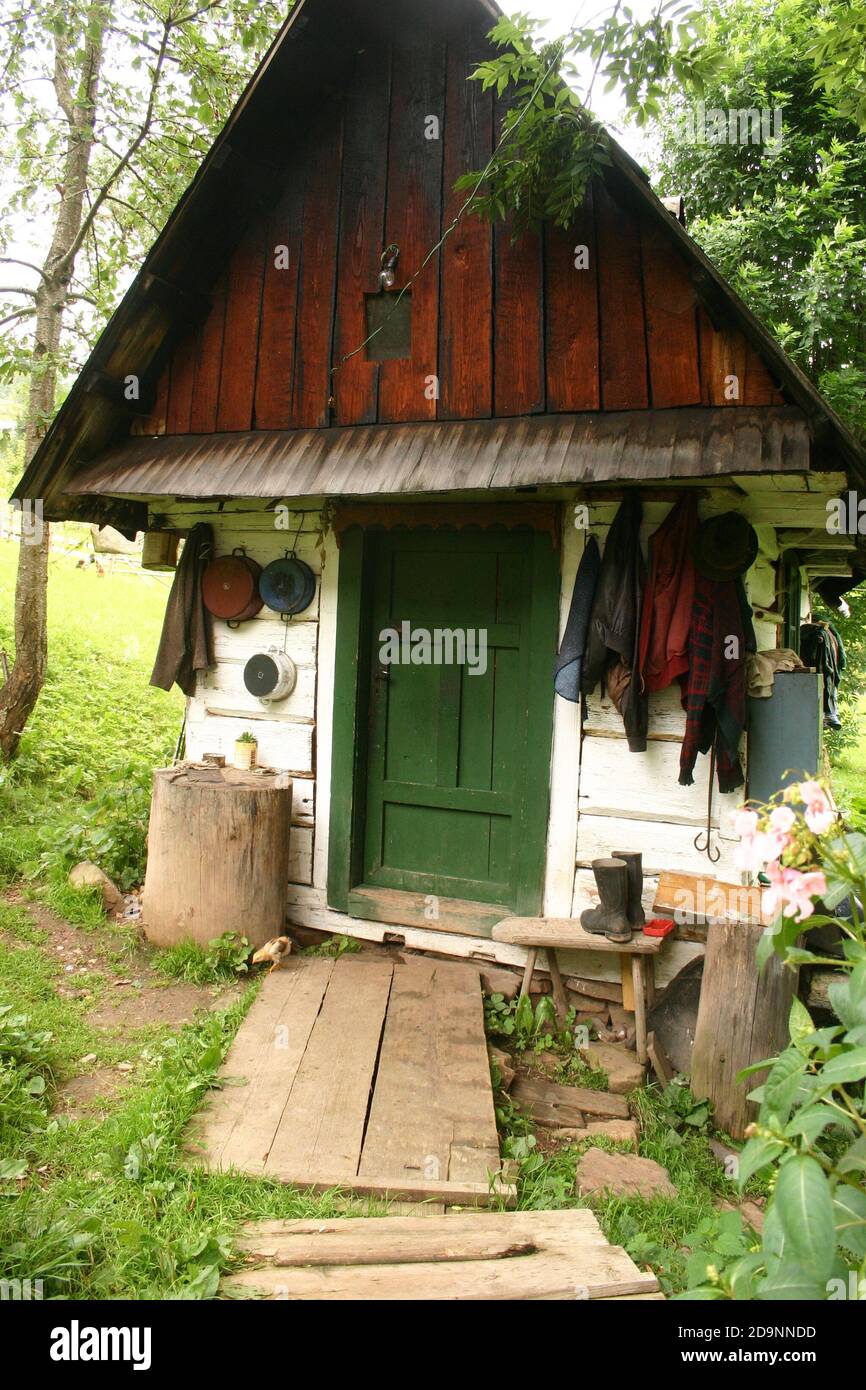 Alba County, Romania. Small wooden hut used as dwelling Stock Photo - Alamy