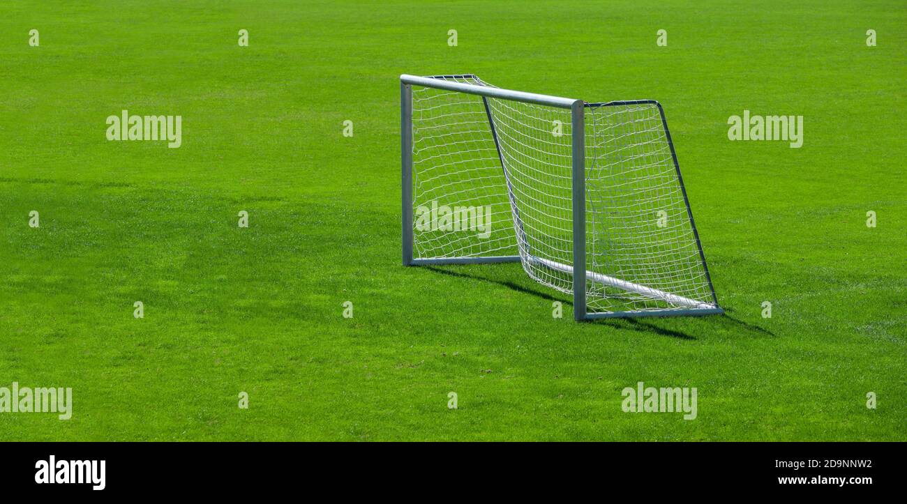 Empty soccer goal on a soccer field Stock Photo - Alamy