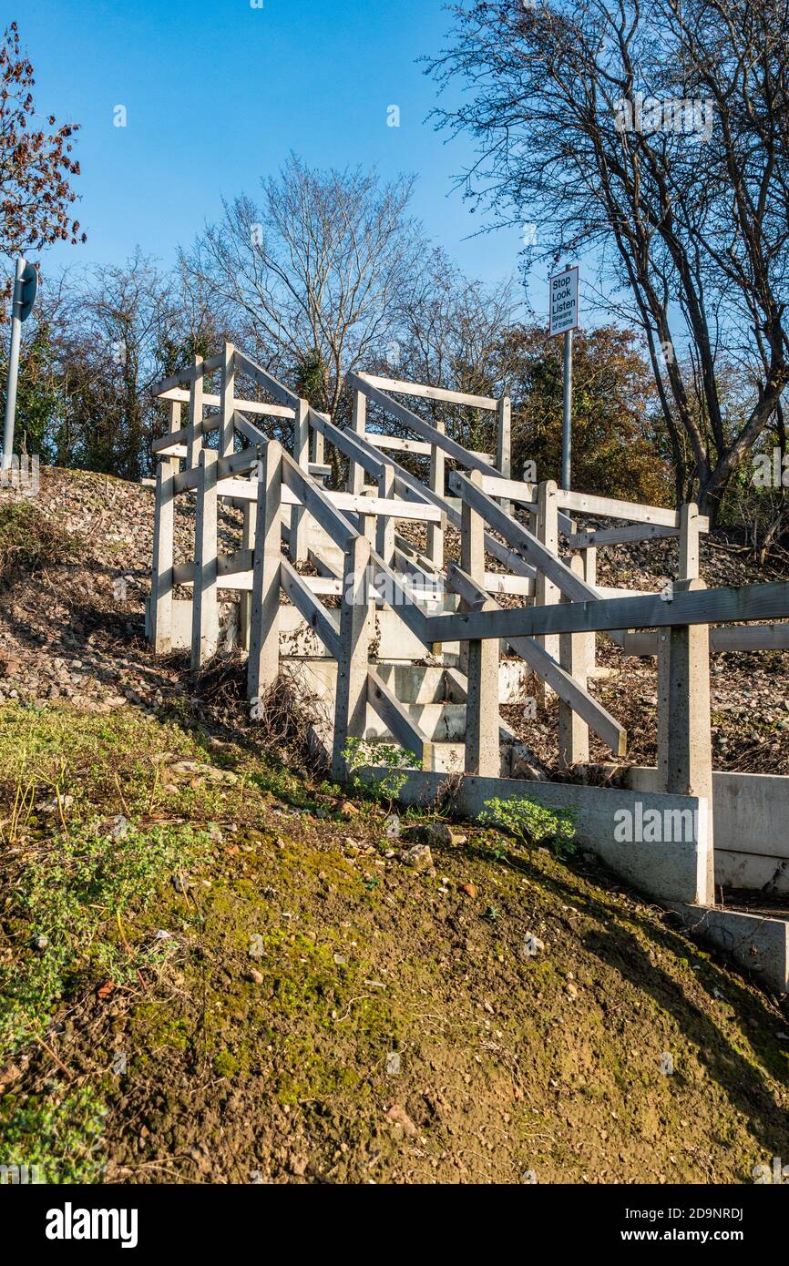 Railway steps up railway embankment Stock Photo - Alamy