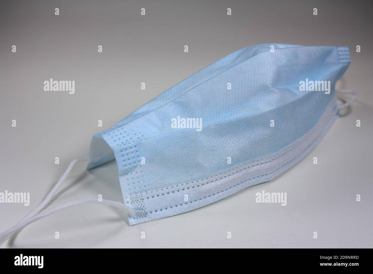 Worn mask hi-res stock photography and images - Alamy