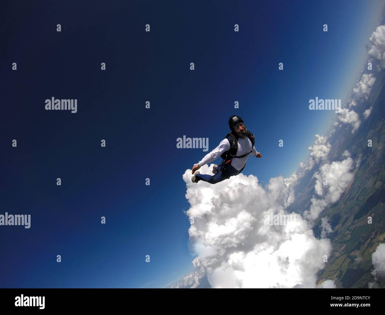 Skydiver a tracking position Stock Photo - Alamy