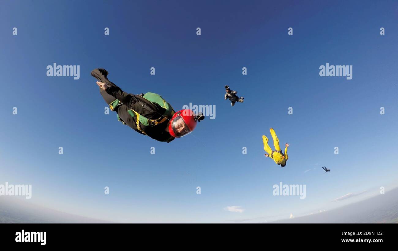 Skydivers a tracking position Stock Photo - Alamy