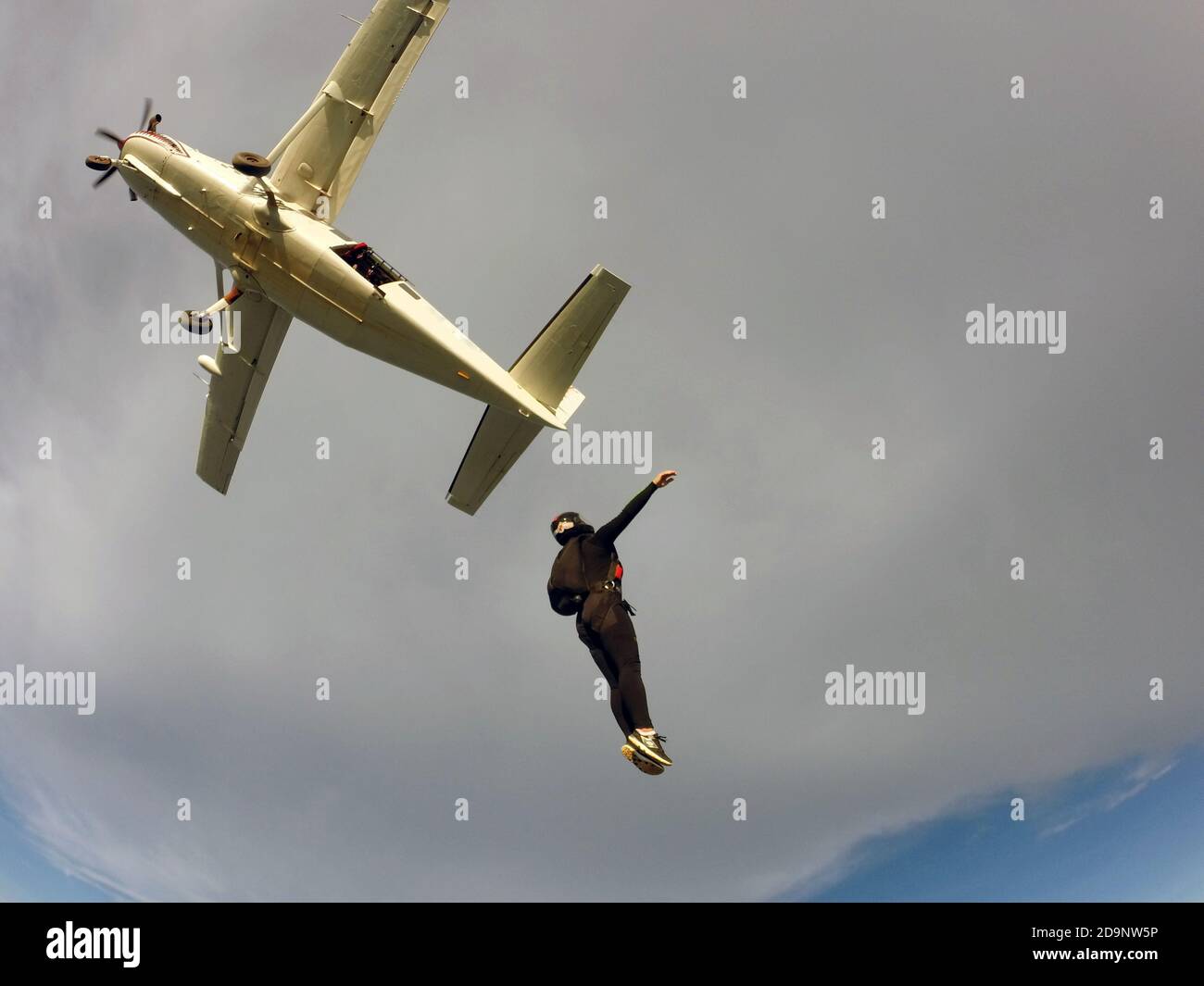 Skydiver jumping from the plane at the sunset Stock Photo - Alamy