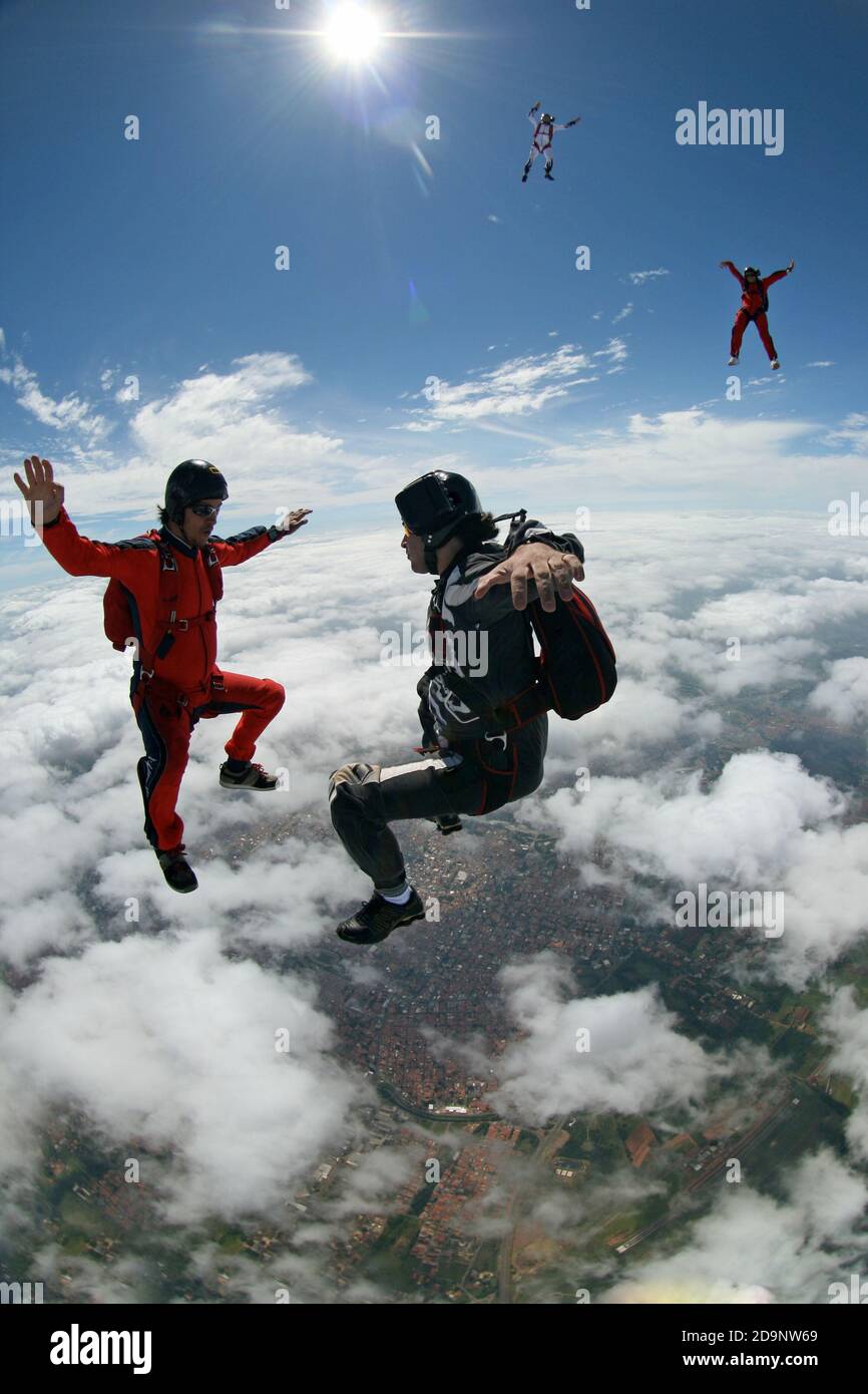 Two friends having fun in freefall Stock Photo - Alamy