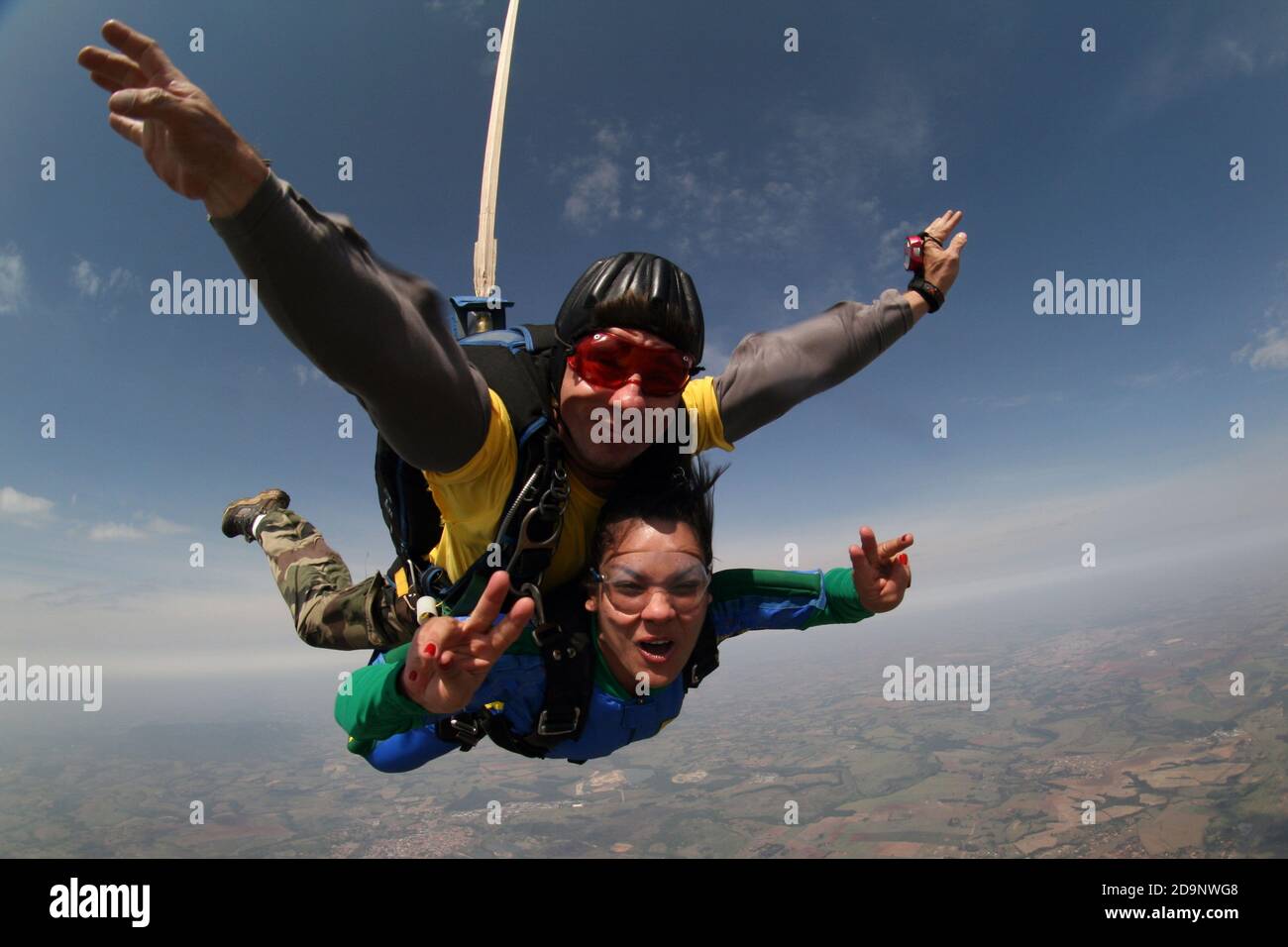 Skydive tandem jump extreme sports Stock Photo - Alamy