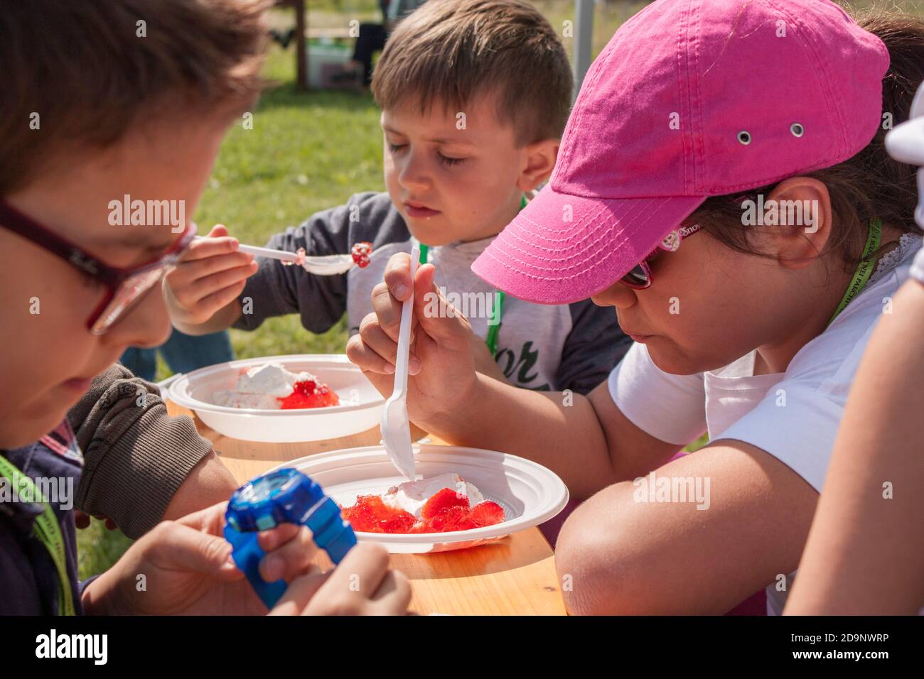 Children eat fruit hi-res stock photography and images - Alamy