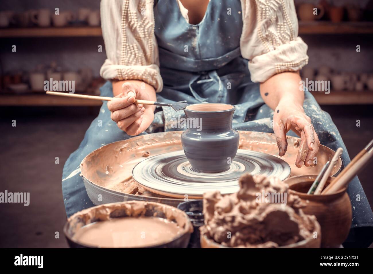 Girl working pottery wheel hi-res stock photography and images - Alamy