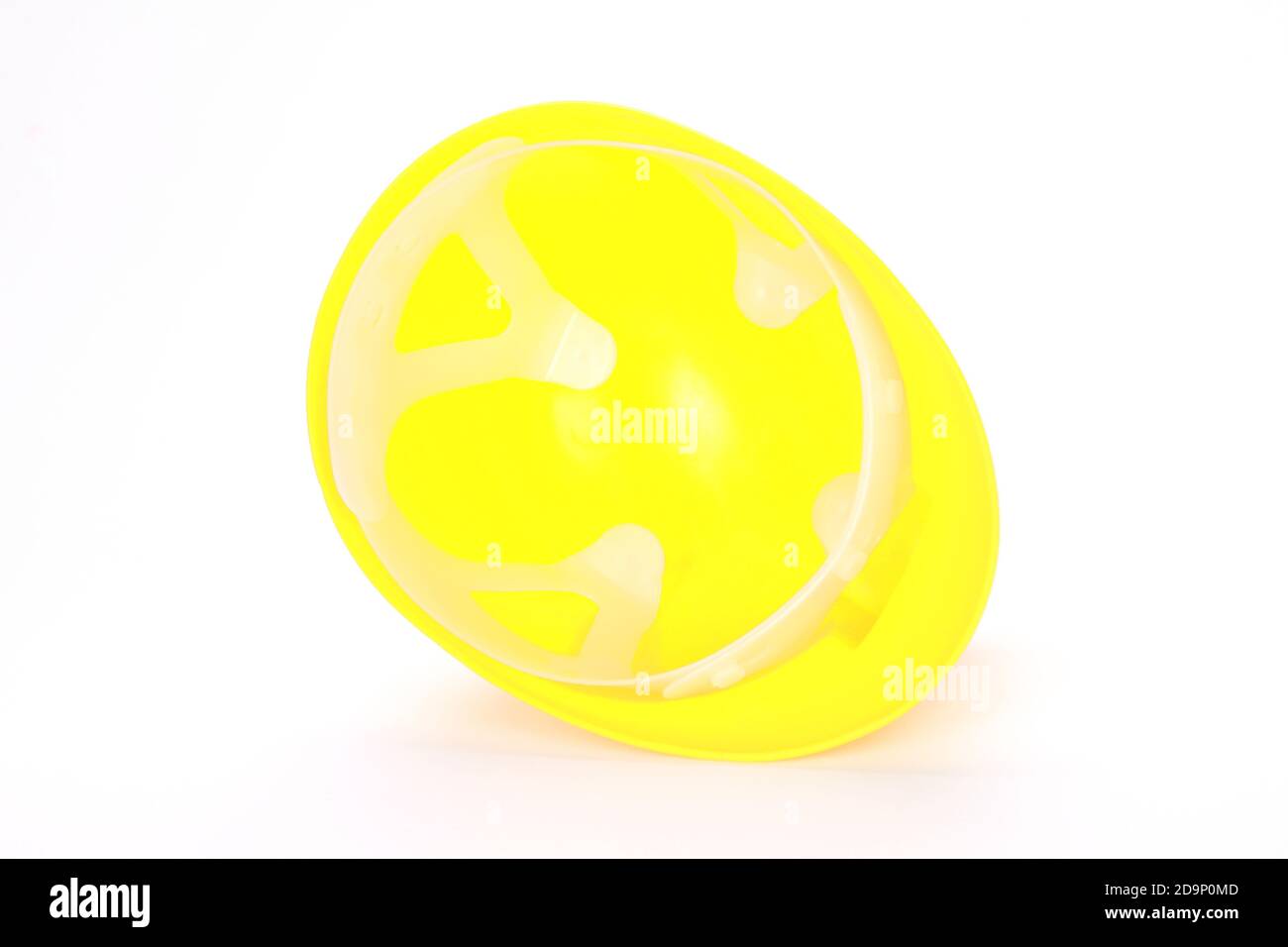 The inside of a yellow construction worker helmet isolated on a white ...