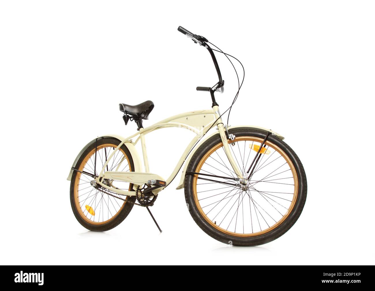 A classic white bicycle with large wheels isolated on a white ...