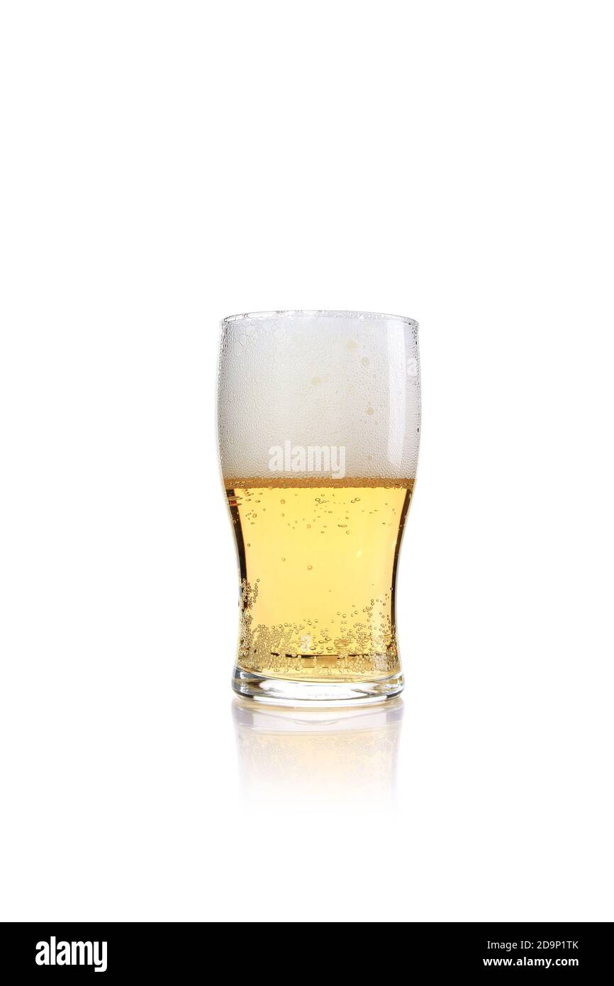A vertical shot of a glass of bubbly beer with foam Stock Photo - Alamy