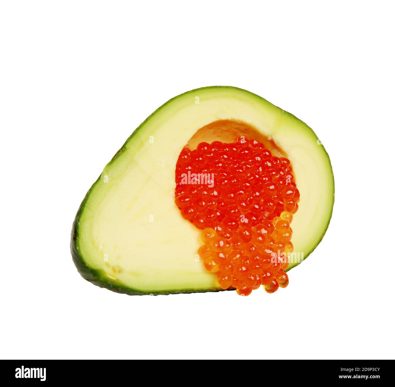 An avocado with orange caviar in the pit hole isolated on a white ...