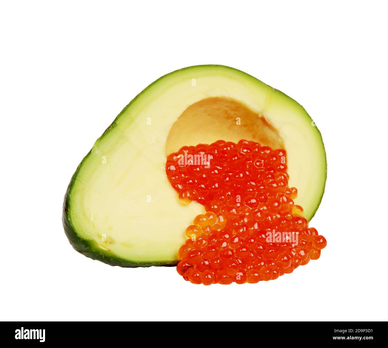An avocado with orange caviar in the pit hole isolated on a white ...