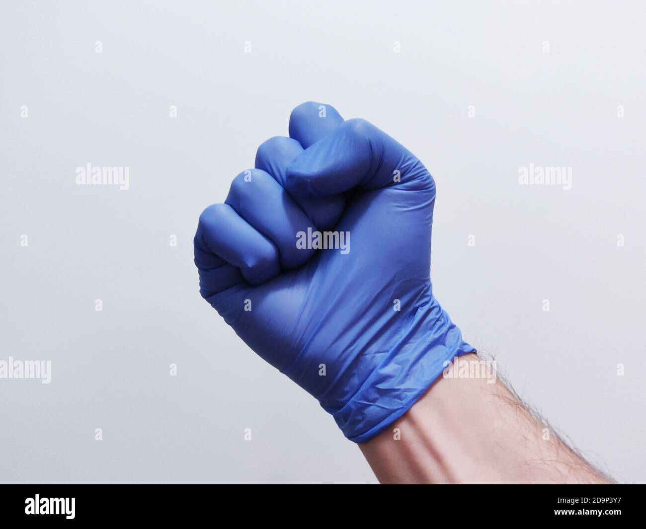 Hand fist gesture in glove hi-res stock photography and images - Alamy