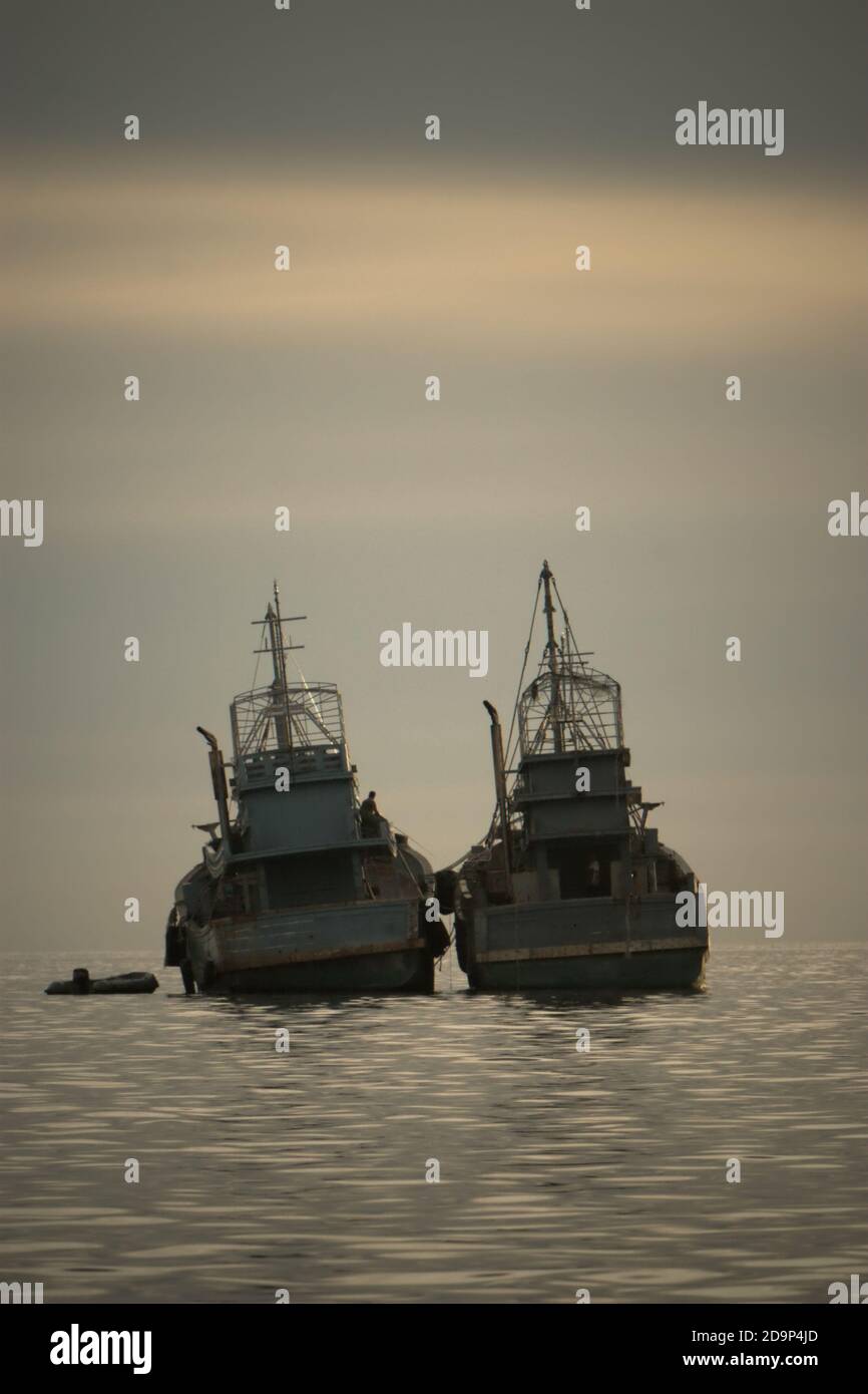 Fishing vessels on Tapian Nauli Bay in North Sumatra province of ...