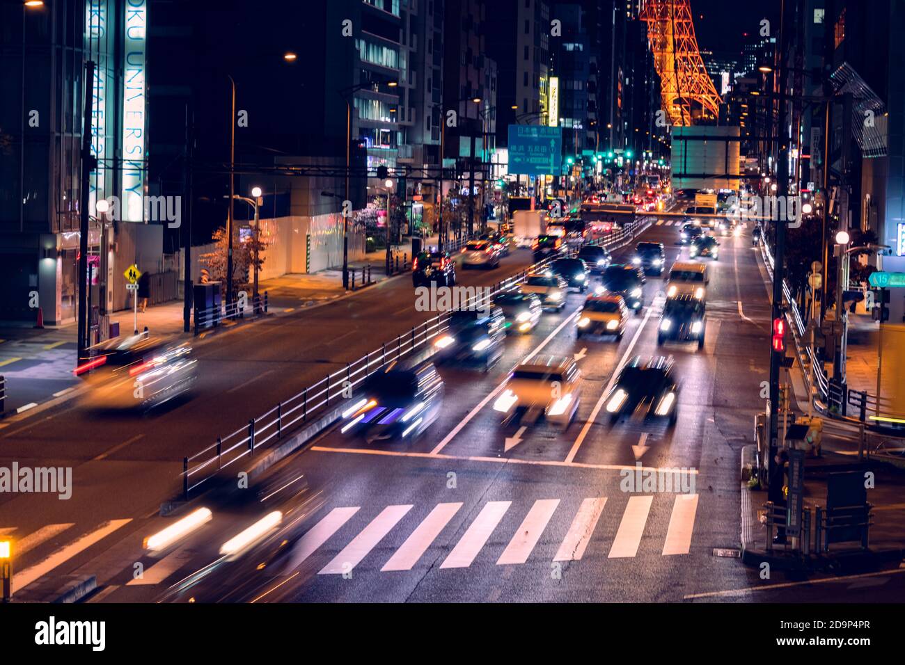 Traffic on the major city road in Tokyo with Tokyo Tower in the ...