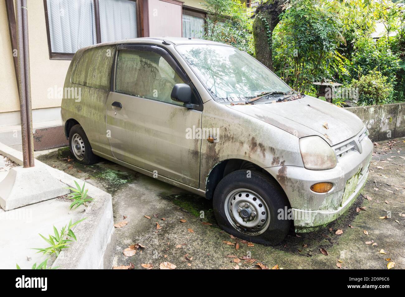 Dirty and dilapidated Japanese Mitsubishi Minica kei car, or mini car ...