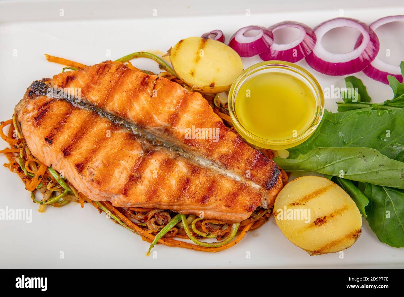 Delicious cooked salmon fish fillets. One piece of baked salmon grilled ...