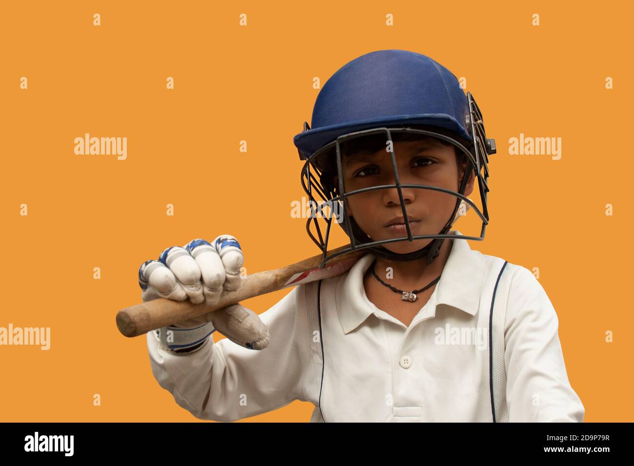 Children playing cricket helmet hi-res stock photography and images - Alamy