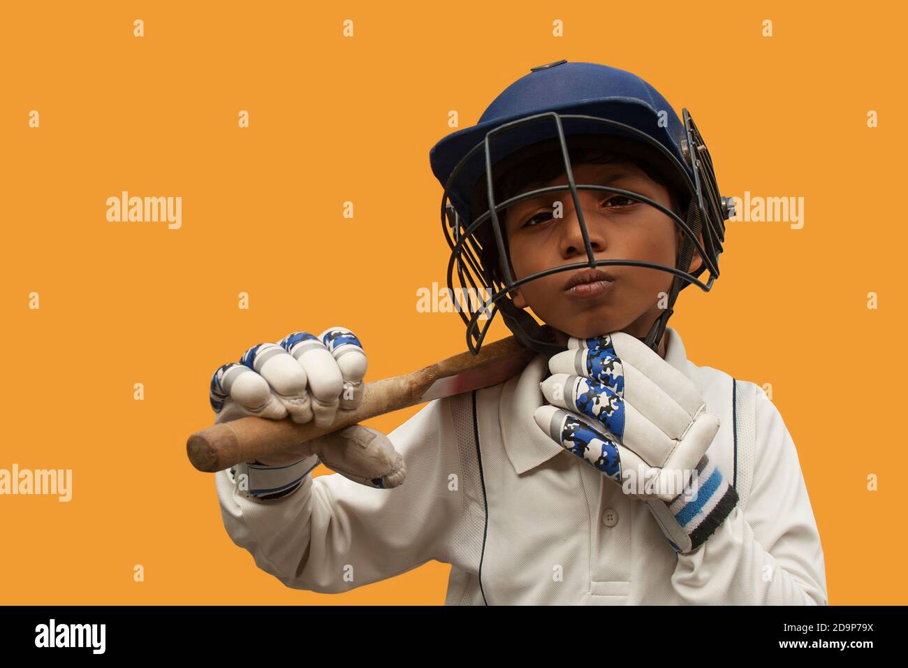 Boy wearing cricket helmet hi-res stock photography and images - Alamy