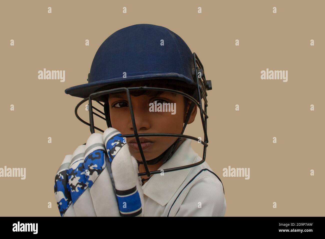 Confident boy wearing cricket helmet and ready for playing Stock Photo ...