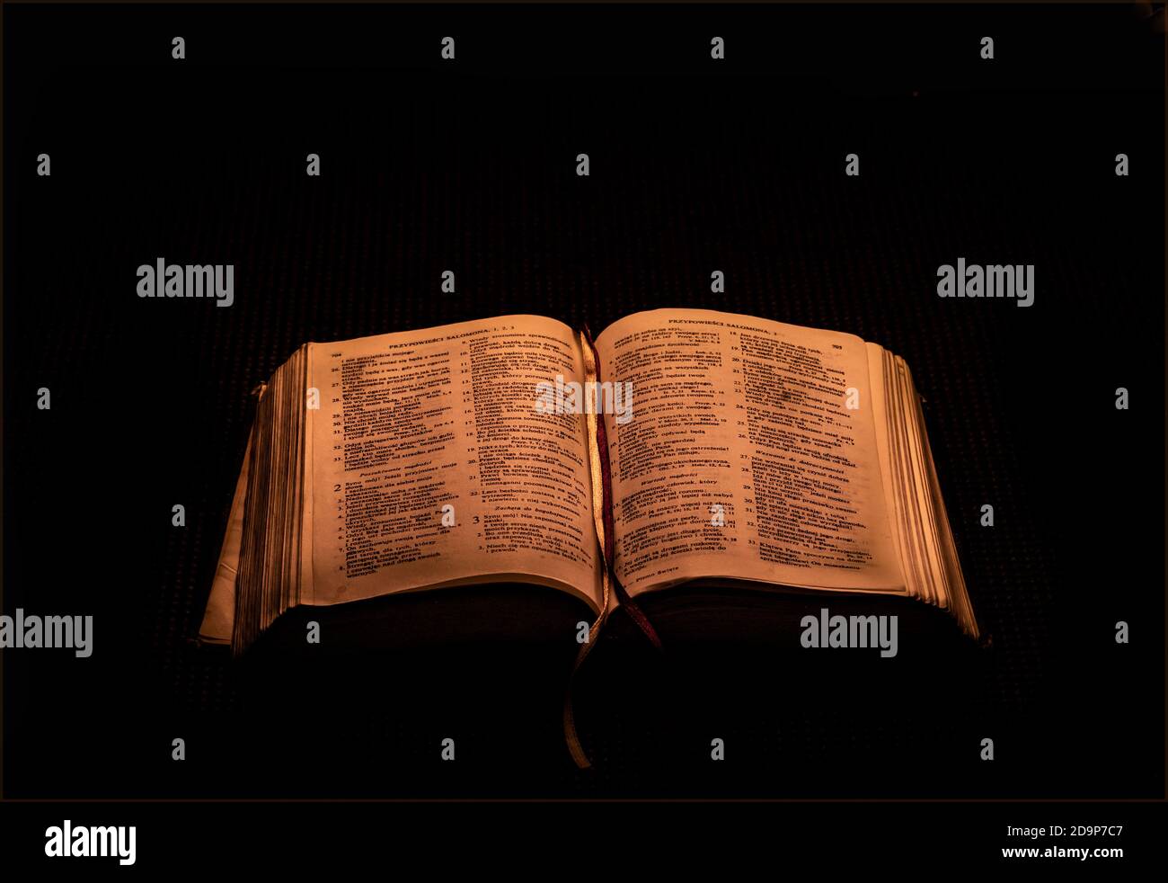 Old vintage looking Bible on black background Stock Photo - Alamy