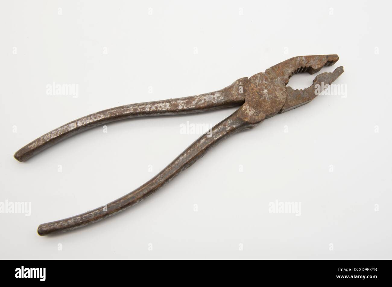 Old rusty pliers on a white background Stock Photo - Alamy