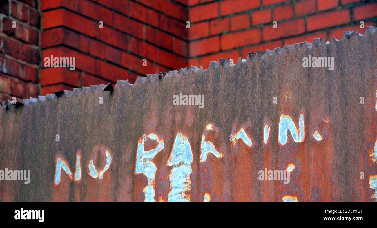 A vintage, old, rusty no parking sign in Manchester, Greater Manchester ...
