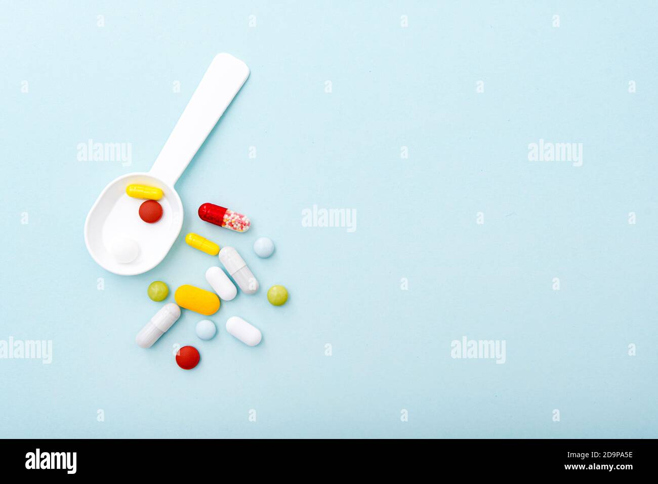 Medical composition with color pills, drugs, top view. Set of capsules ...