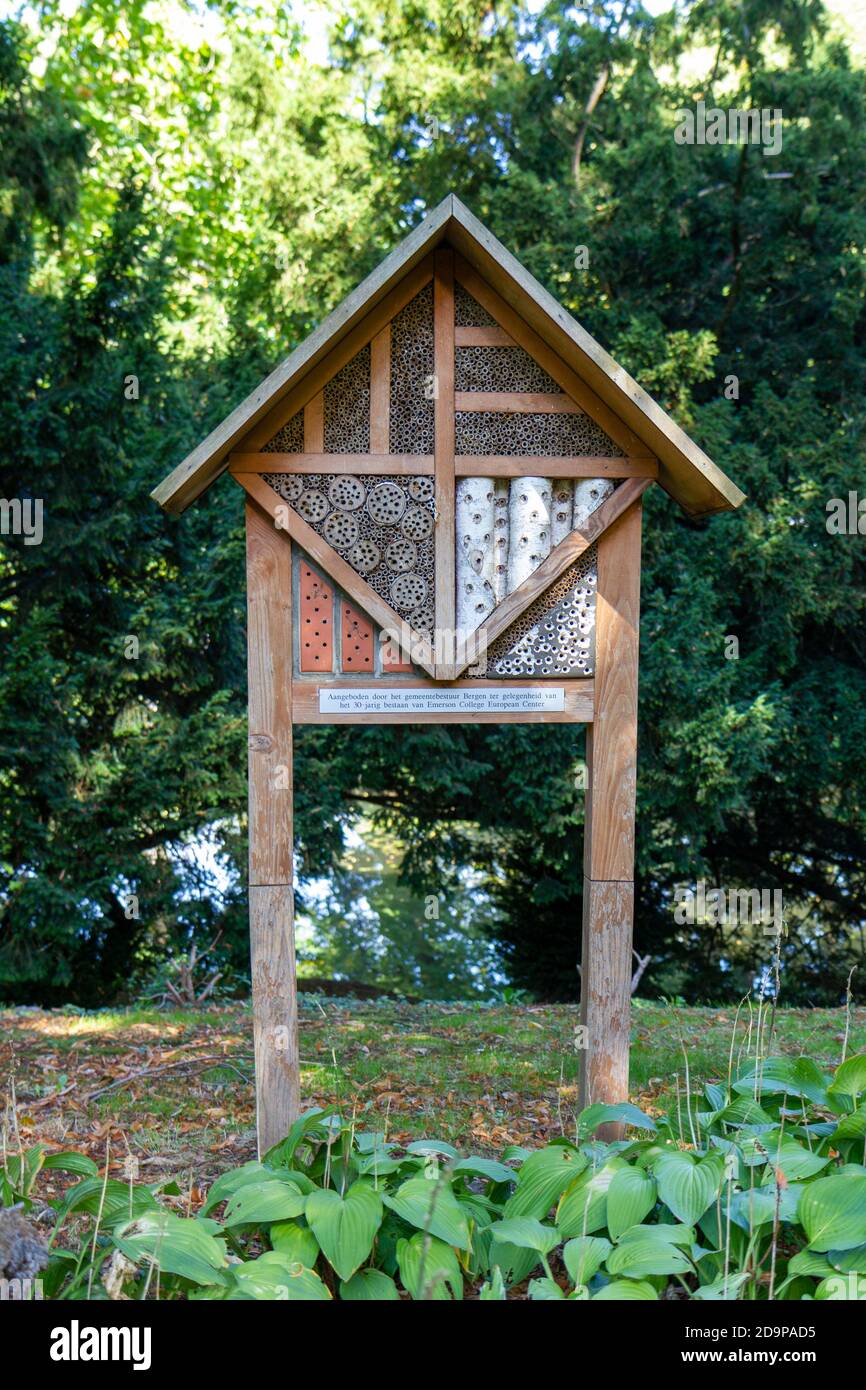 Insect hotel in the garden Stock Photo - Alamy