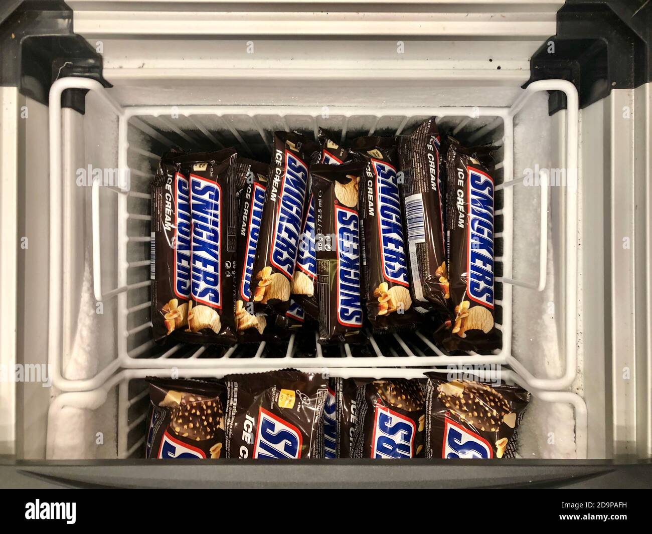 Snickers Ice cream inside a chiller Stock Photo - Alamy