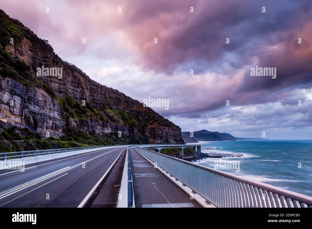 Sunset Scape and Sea Cliff Bridge along Pacific Coastline before a ...