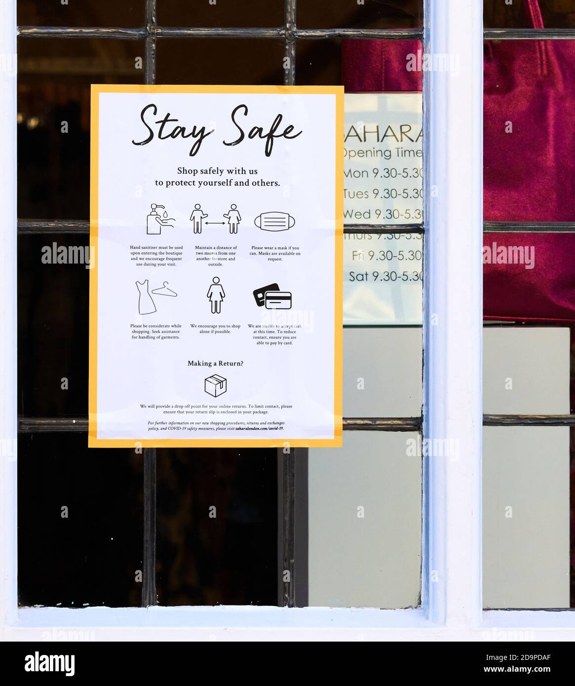 ‘Stay safe’ notice in the window of Sahara clothes shop at Cambridge ...