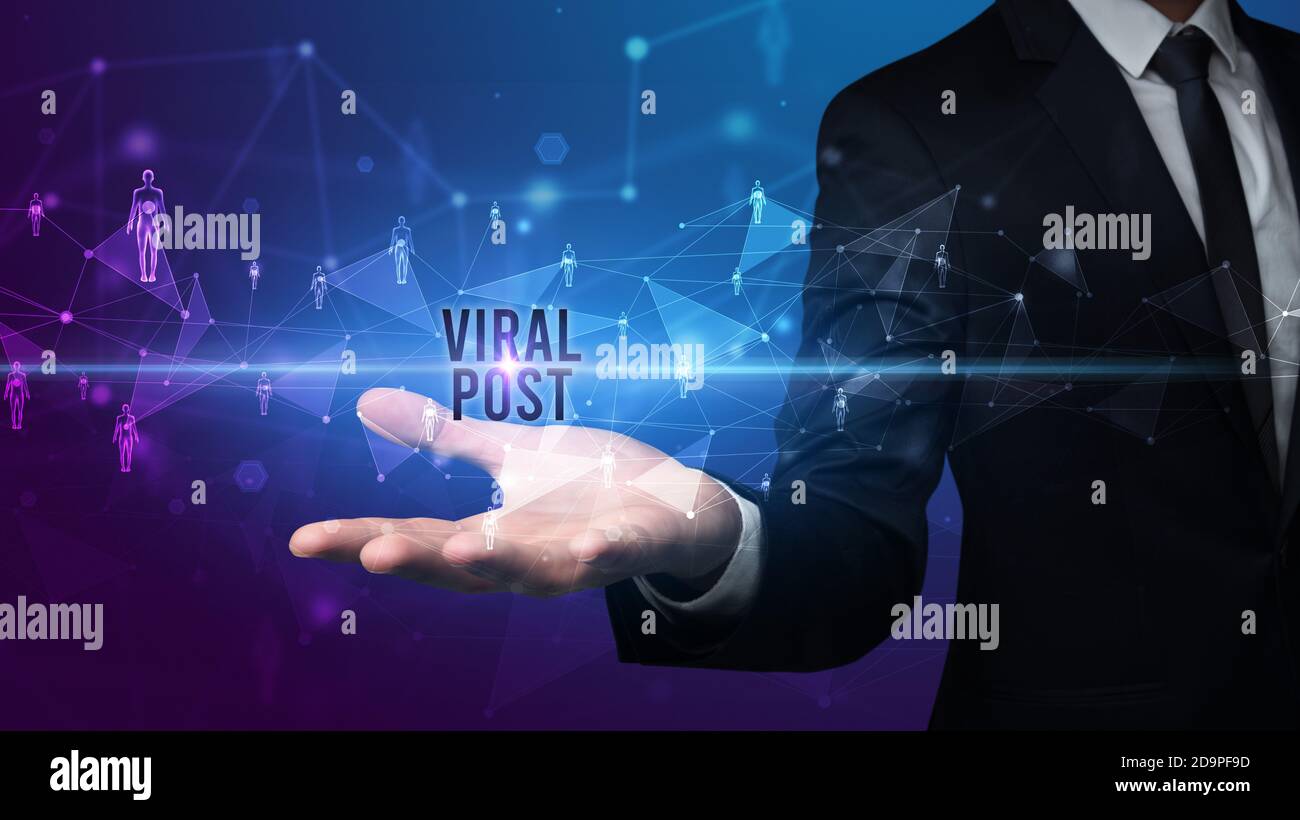 Elegant hand holding VIRAL POST inscription, social networking concept ...