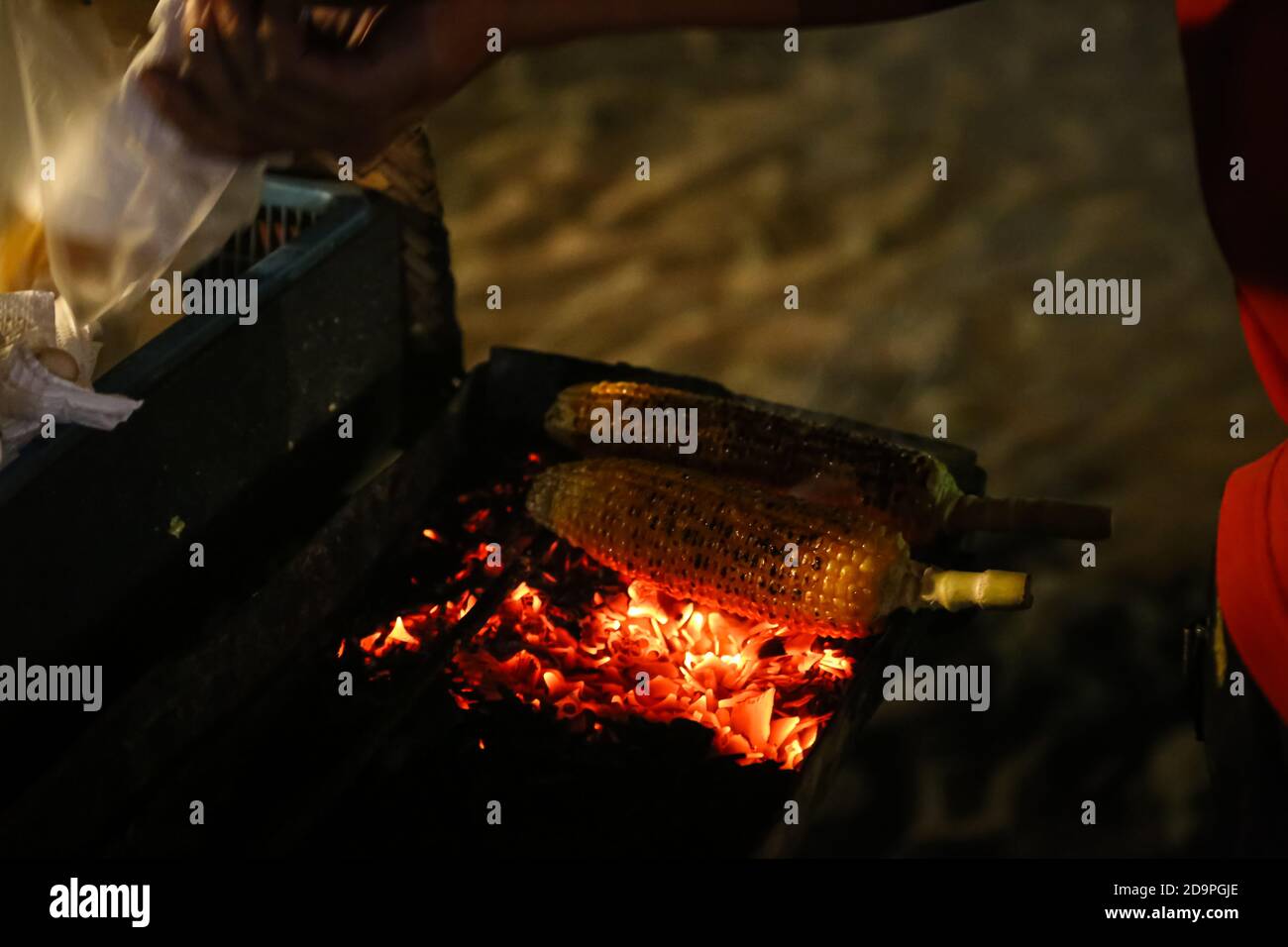 A charcoal grilled corn, typical asian snacks Stock Photo - Alamy