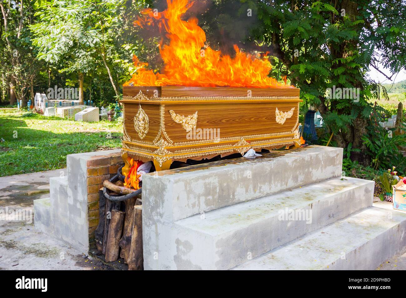 fire on the coffin for cremation, thai culture Stock Photo - Alamy