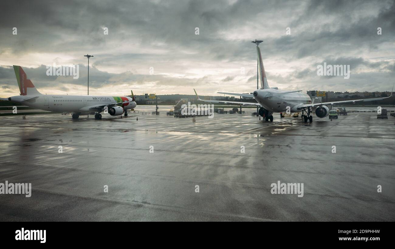 Airplanes of the TAP Portugal airline company standing on the ground ...