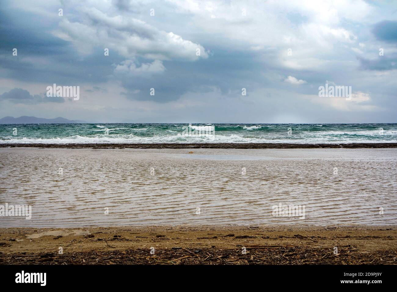symmetrical photographs of seascapes, with waves of the sea and sky ...