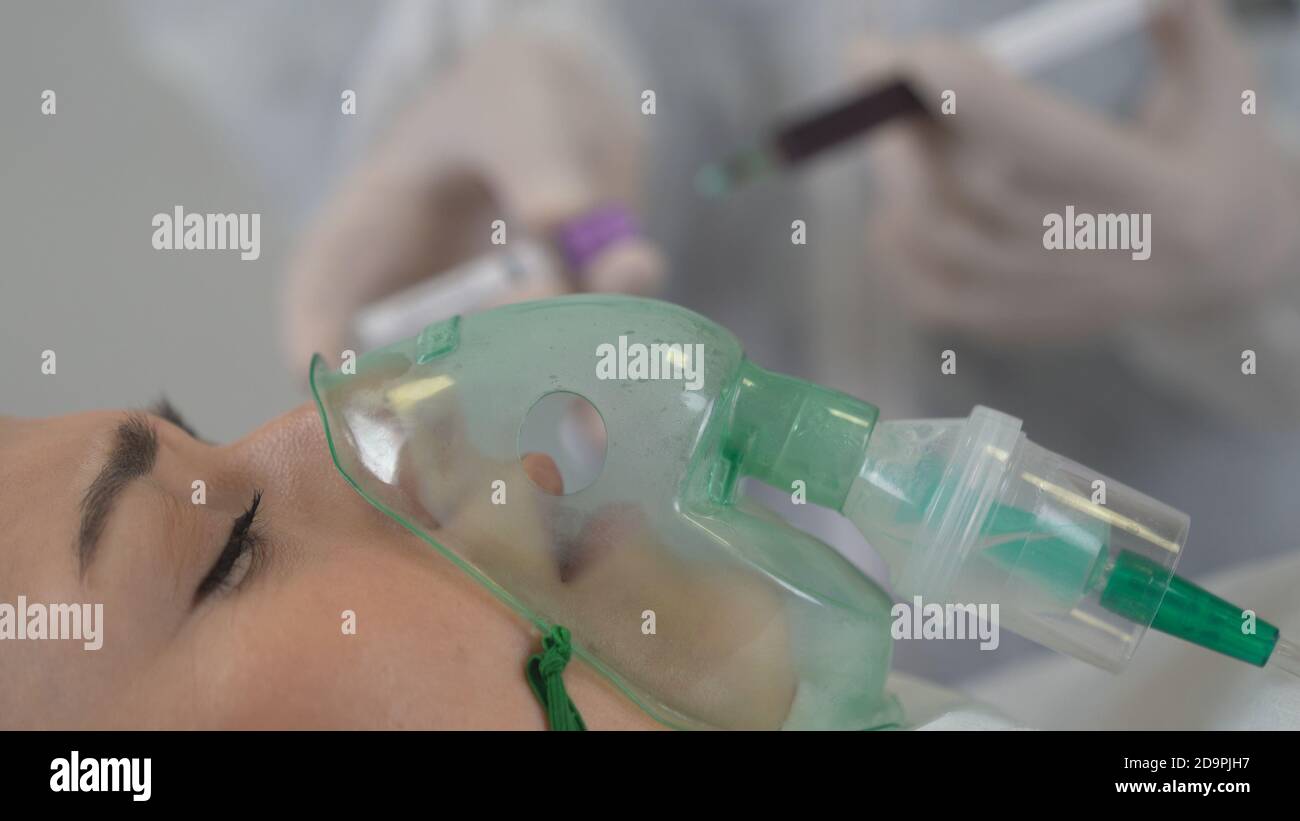 Boy receiving oxygen treatment hi-res stock photography and images - Alamy