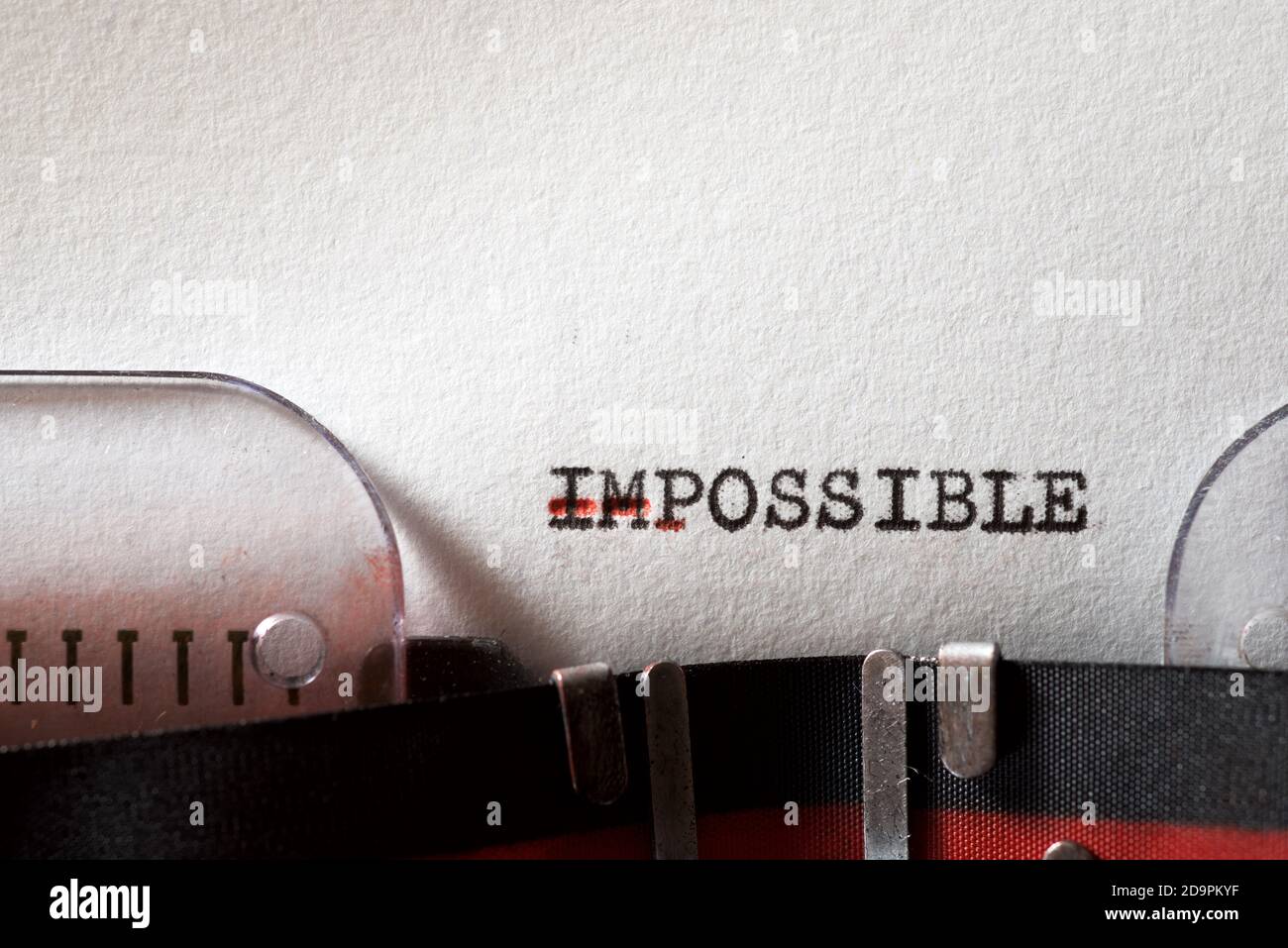 Impossible word written with a typewriter Stock Photo - Alamy