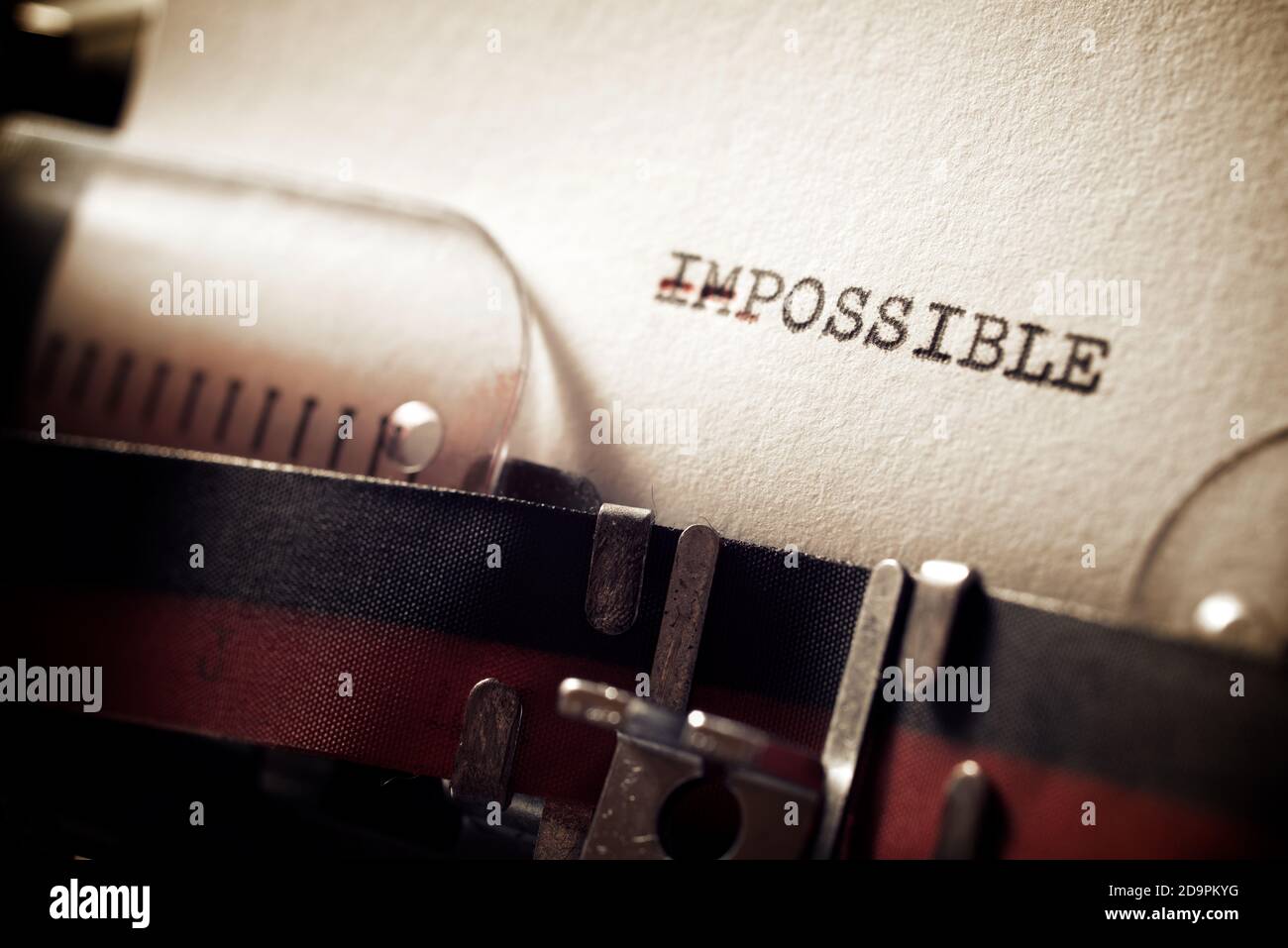 Impossible word written with a typewriter Stock Photo - Alamy