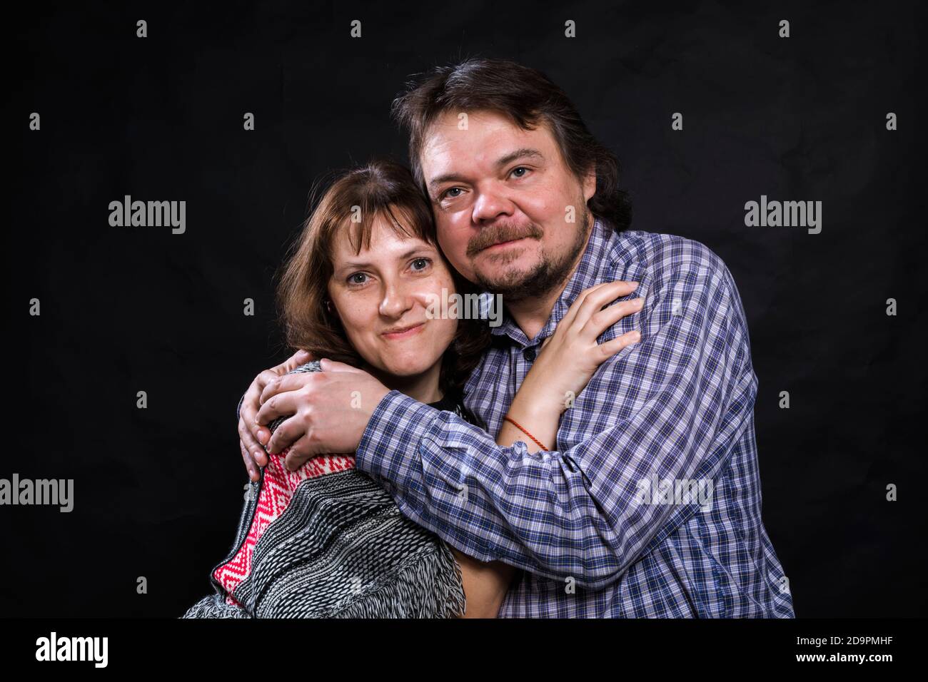 Adult man and woman are happy to be together studio portrait Stock ...