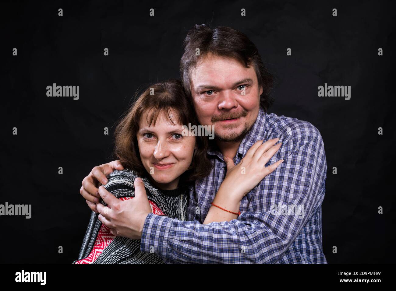 Adult man and woman are happy to be together studio portrait Stock ...