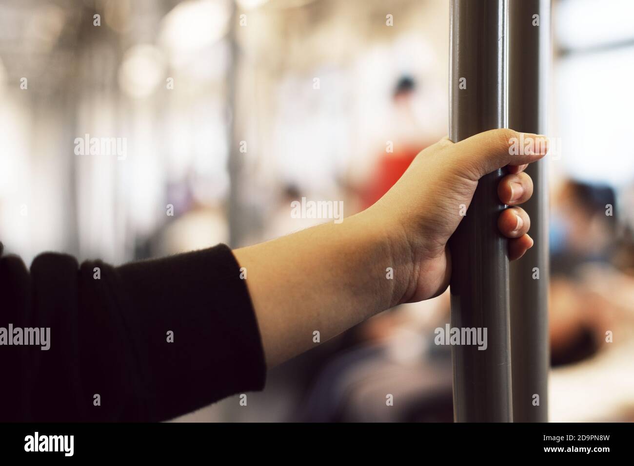 Holding train pole hi-res stock photography and images - Alamy